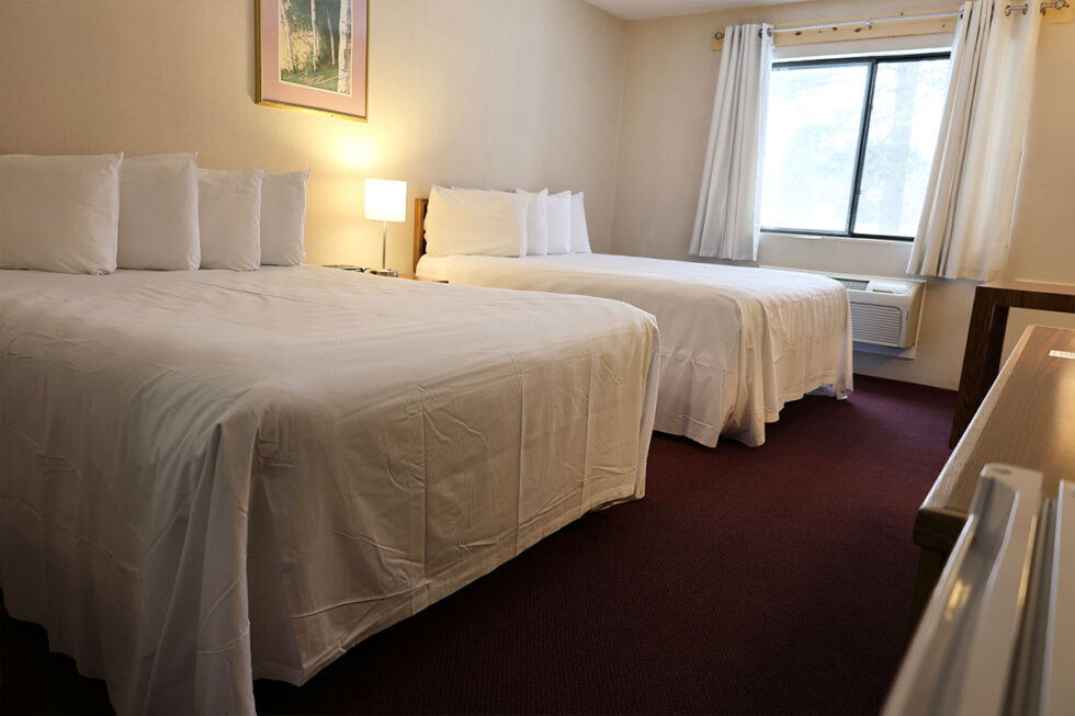Rooms - Paradise Inn & Suites