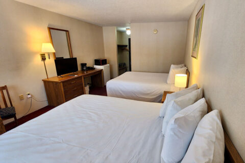 Rooms - Paradise Inn & Suites